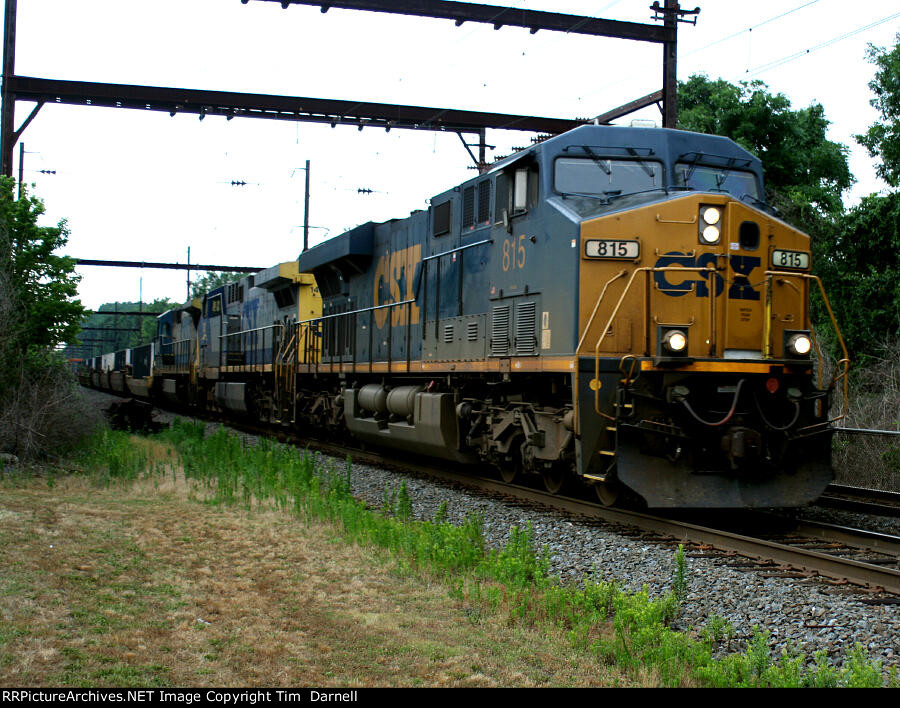 CSX 815, 141, 7523 on Q034.